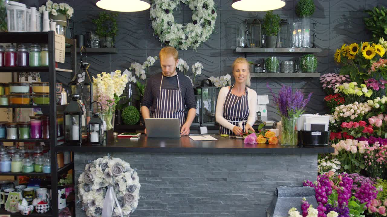 Premium stock video - Two people working in shop