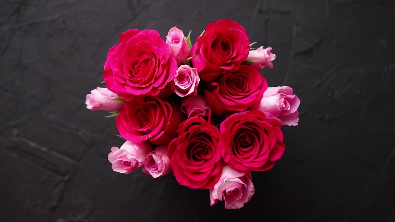 Premium stock video - Pink roses bouquet packed in red box and placed ...