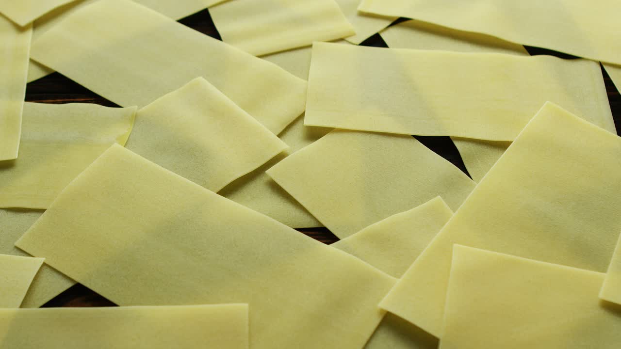 Premium stock video - Sheets of dough for lasagne