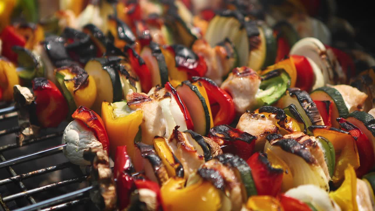 Premium stock video - Overcooked and burned shashliks on hot barbecue grill