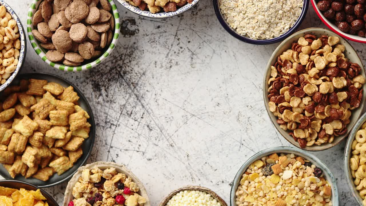Premium stock video - Assortment of different kinds cereals placed in ...