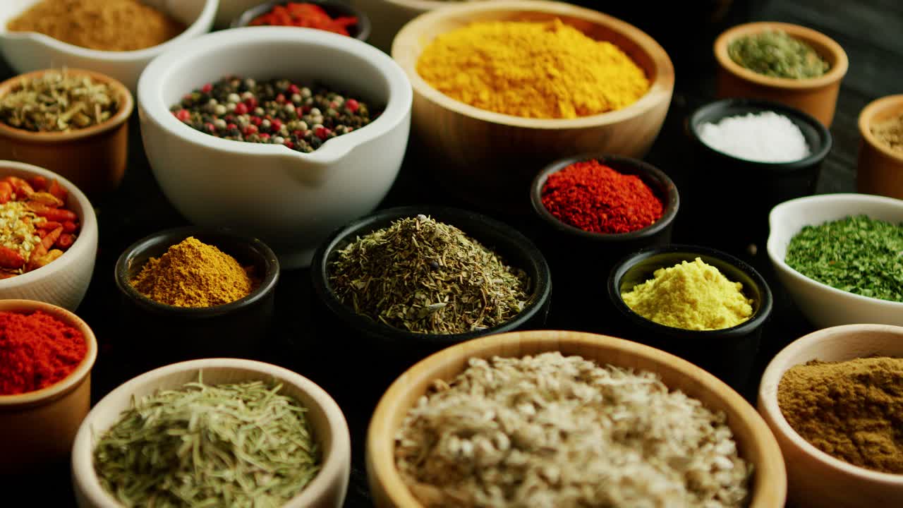 Premium stock video - Many bowls with different spices