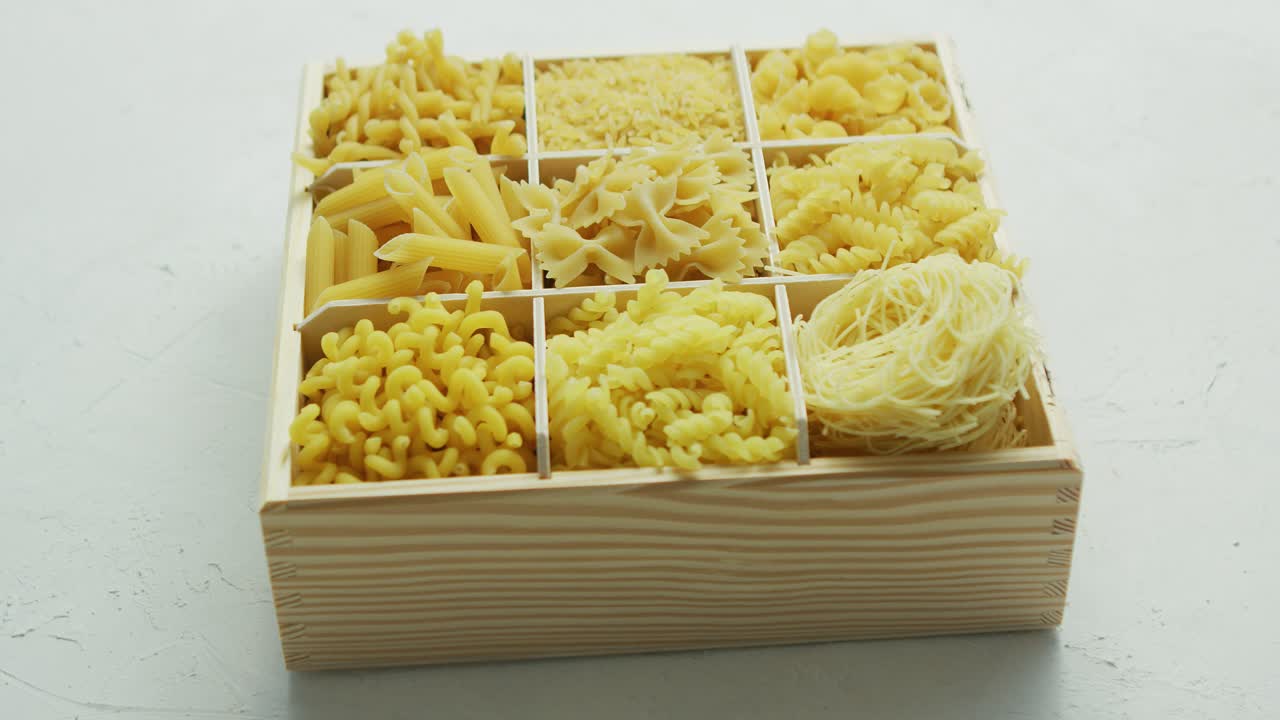Premium stock video - Different kind of macaroni in box