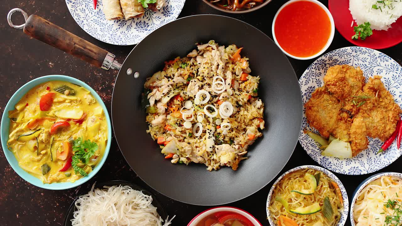 Premium stock video - Asian oriental food composition in colorful dishware