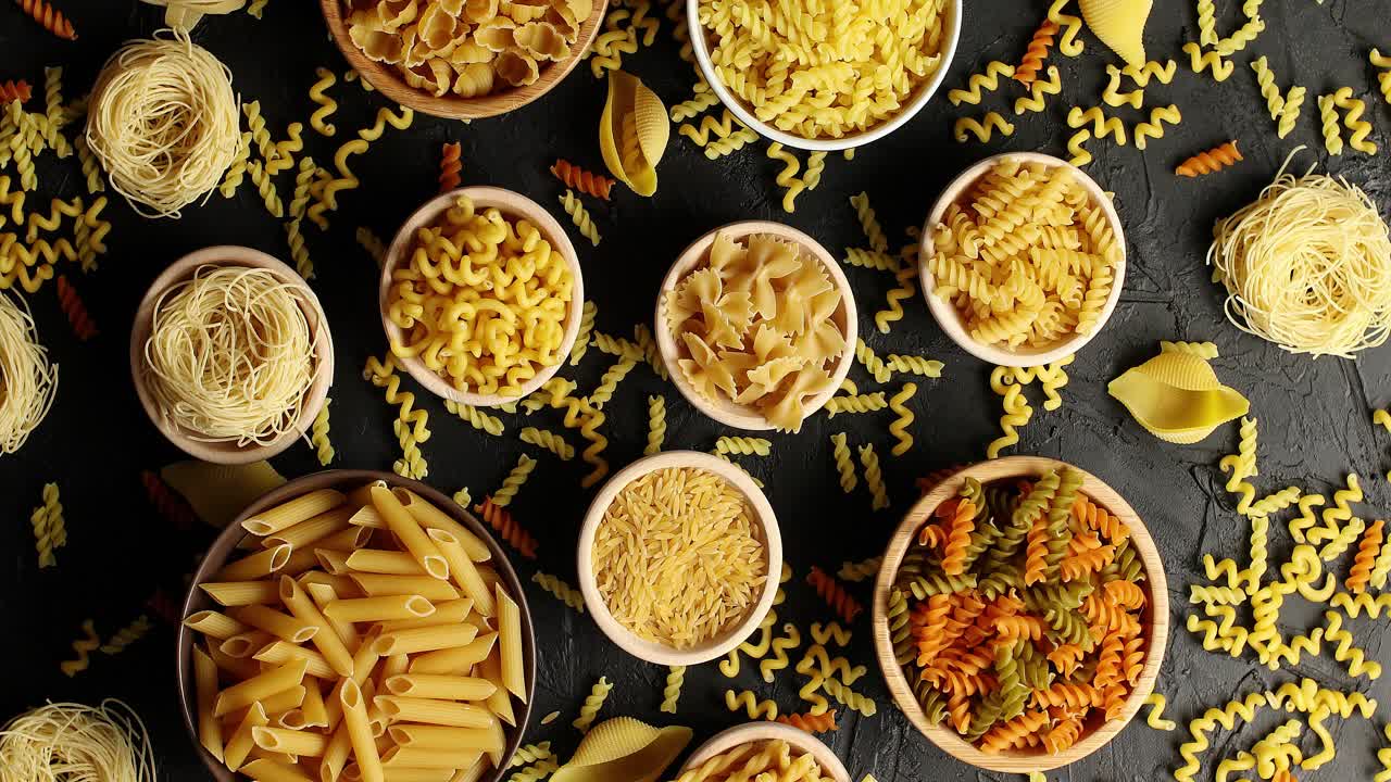 Premium stock video - Bowls of pasta and macaroni in assortment