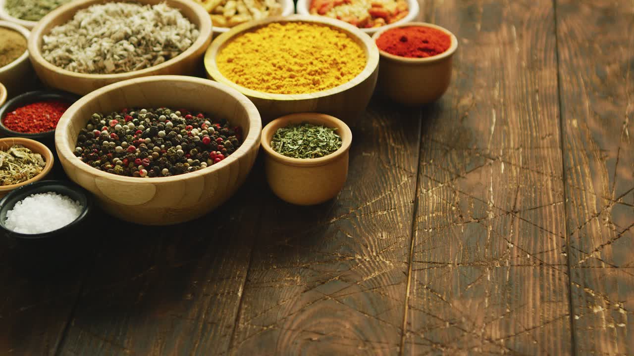 Premium stock video - Arrangement of spices in small bowls