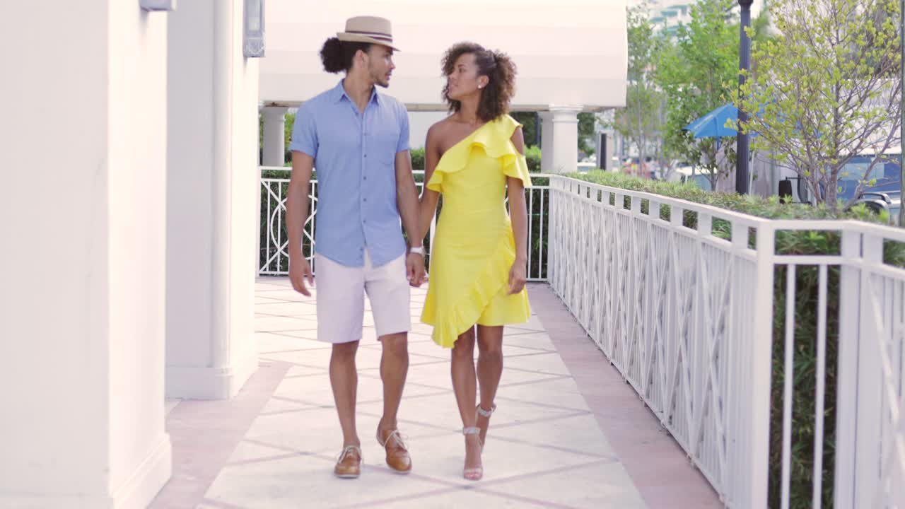 Premium stock video - Woman kissing shoulder of boyfriend