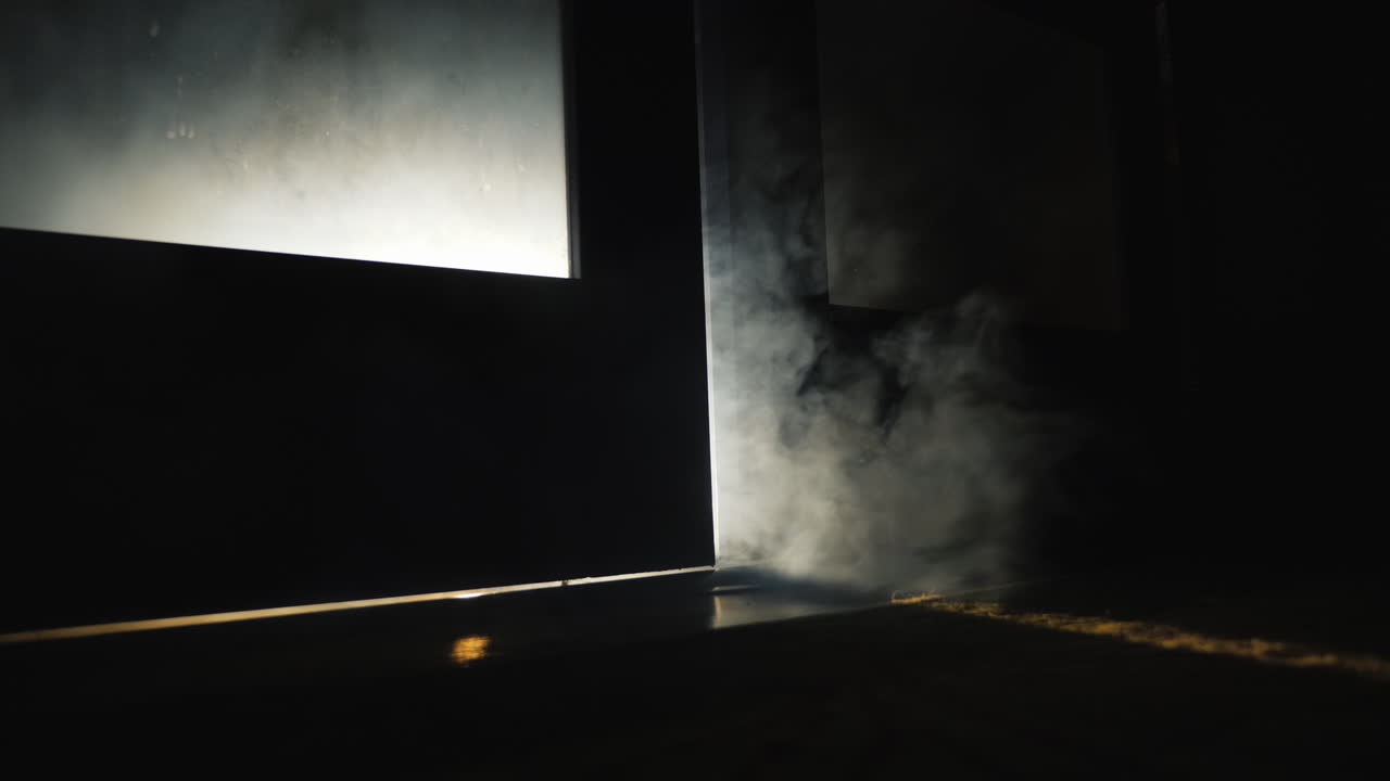 Premium stock video - Smoke of fire coming from the cracks under the ...