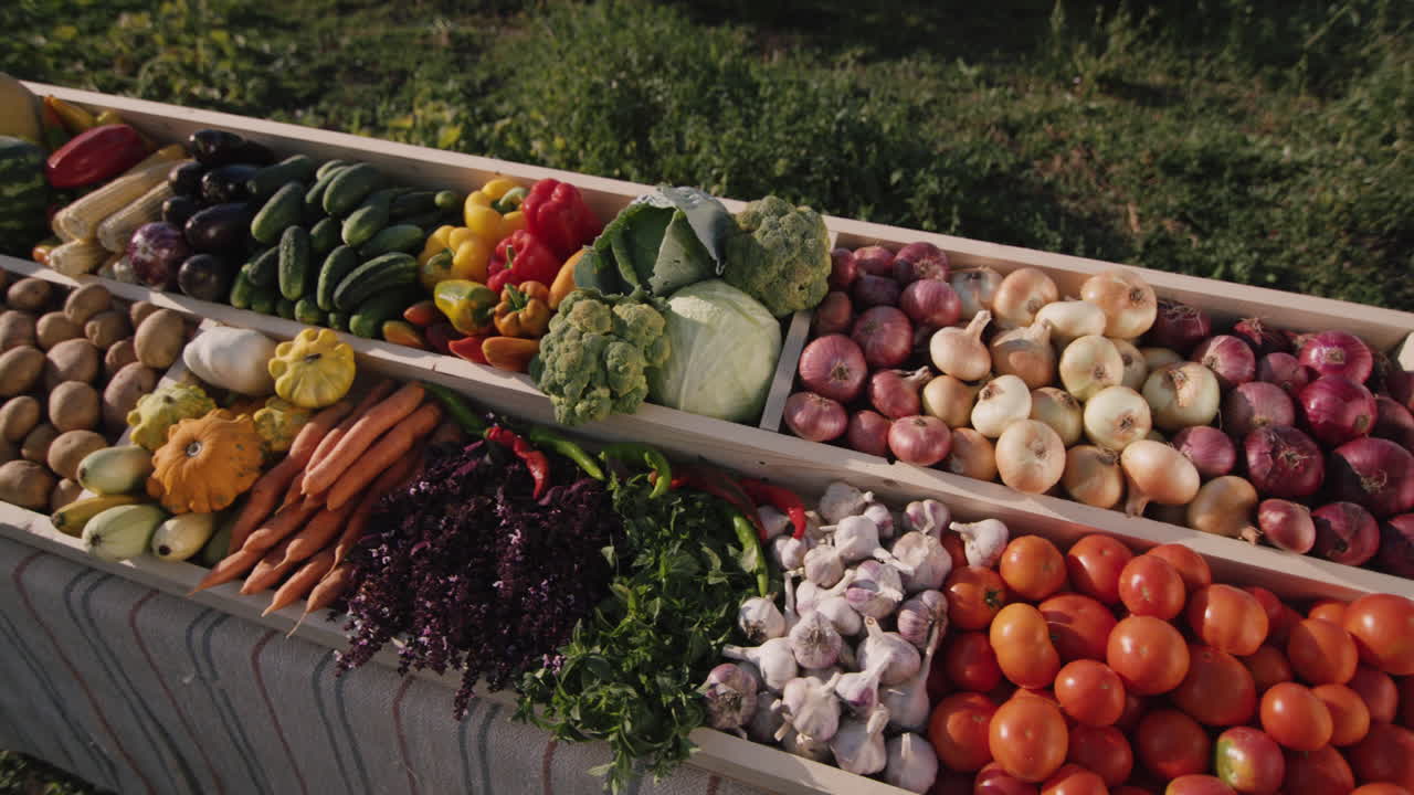Premium stock video - Vegetable counter at farmers market 1