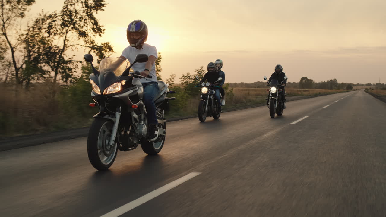 Premium stock video - A group of bikers ride on motorcycles on the ...