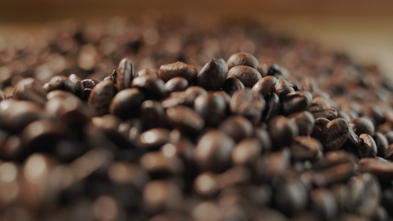 Premium stock video - Beans of roasted natural coffee 3