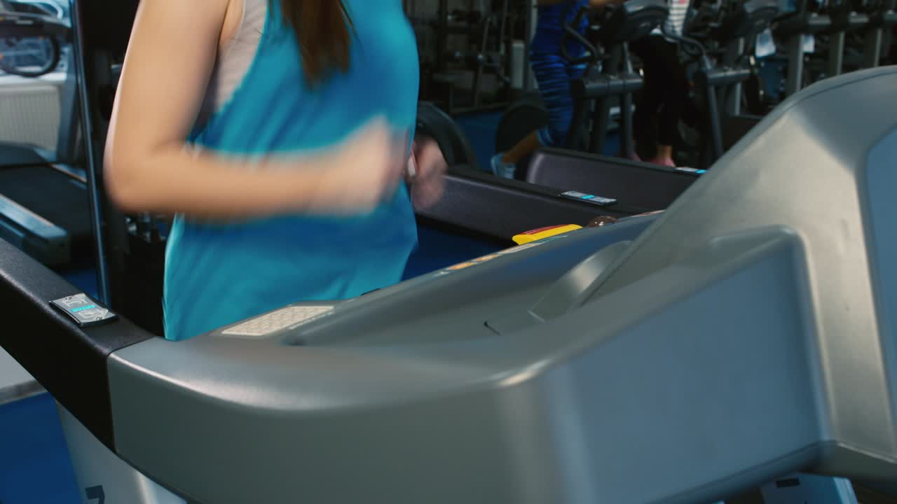 Premium stock video - Young people train in the gym 1