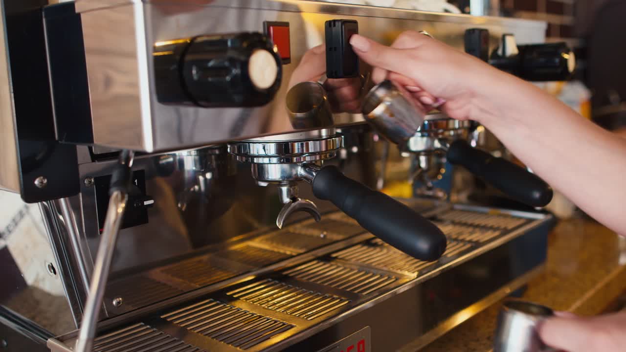 Premium stock video - Professional barista makes coffee
