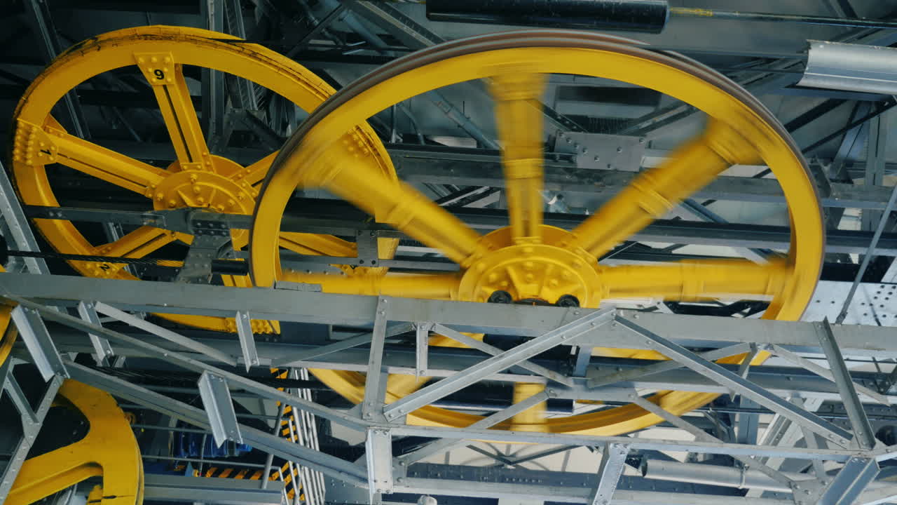 Premium stock video - Huge wheels of the internal mechanism of a funicular