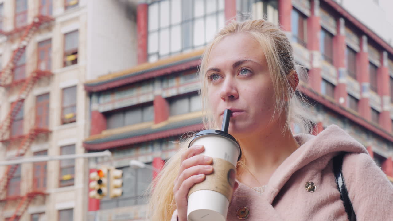 Premium Stock Video Young Tourist Drink Bubble Tea In Chinatown New