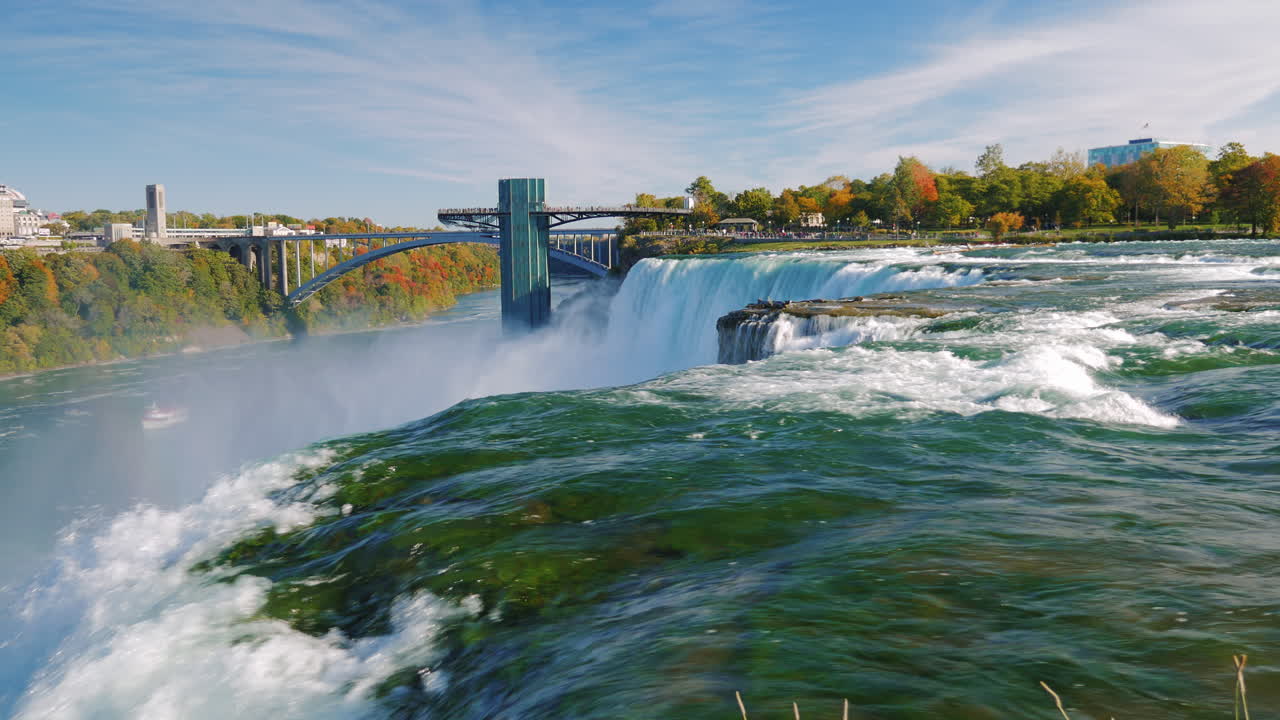 Premium stock video - The famous niagara falls and buildings on the ...