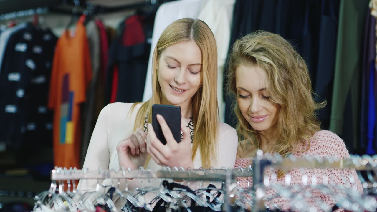 Premium stock video - Shopping with the smartphone