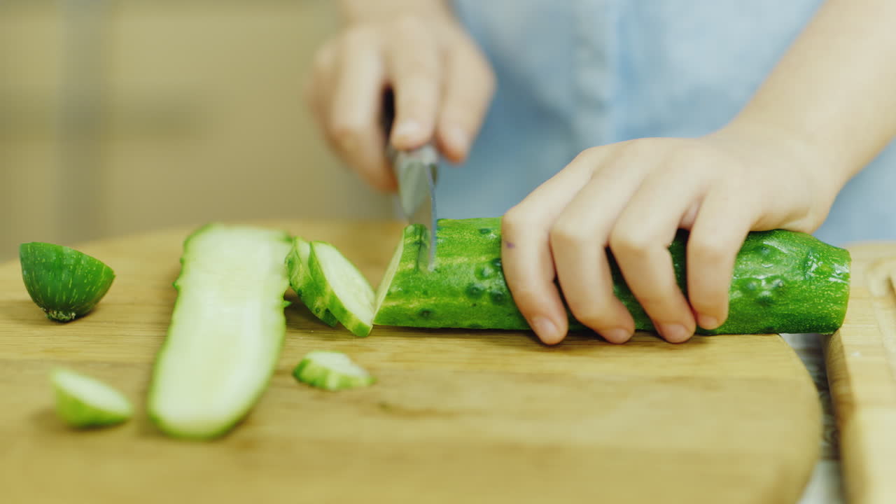 Premium stock video - Children learning to cook