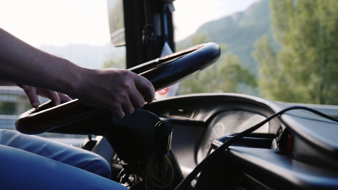 Premium stock video - Close-up of the steering wheel of the bus