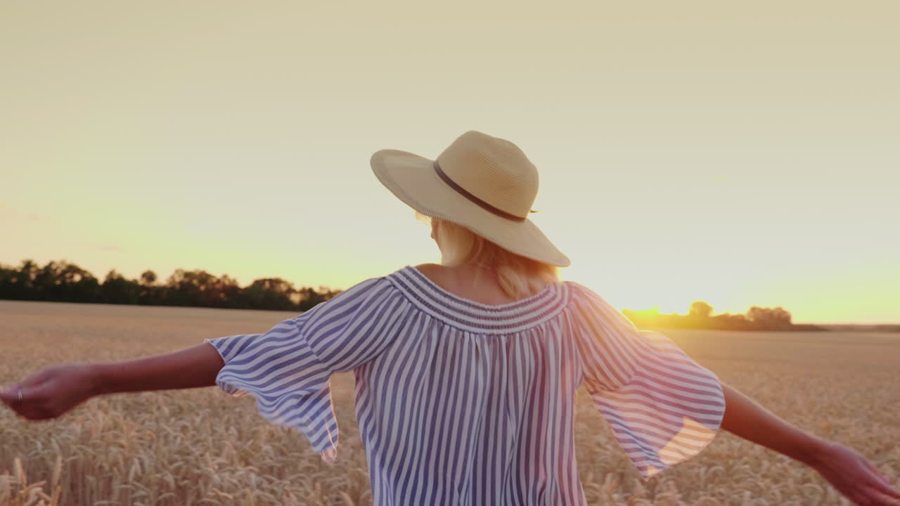 Premium stock video - Enjoy the fresh air walk around the wheat field ...