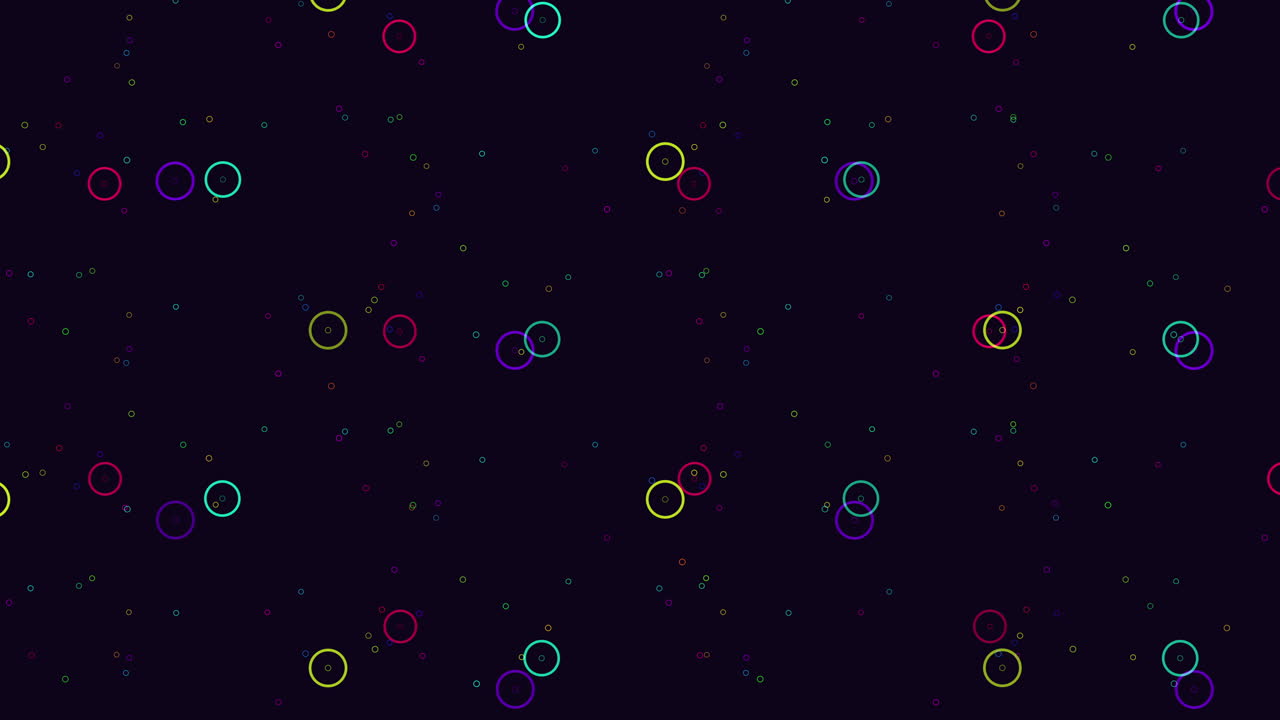 Premium stock video - Rainbow rings and dots pattern with neon light