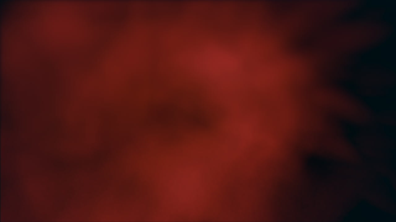 Premium stock video - Glowing red cloud in dark sky