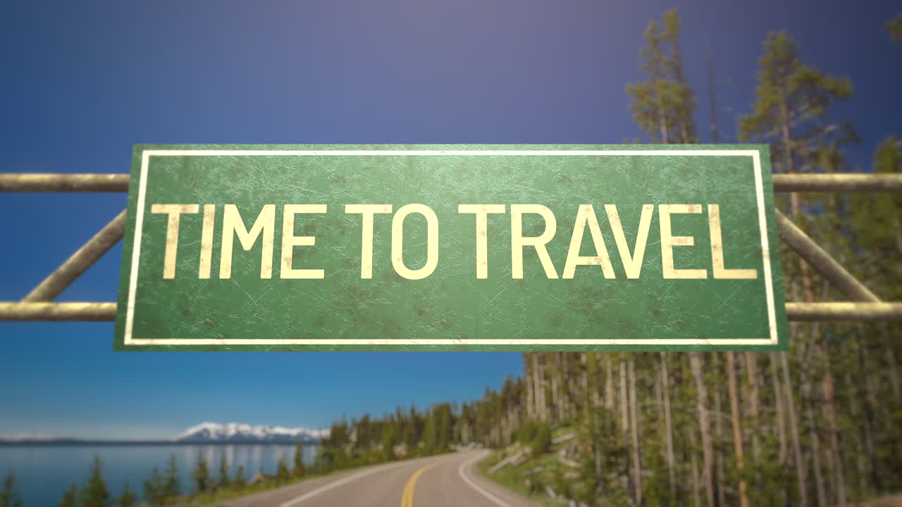 Premium stock video - Time to travel on road sign with road and forest ...